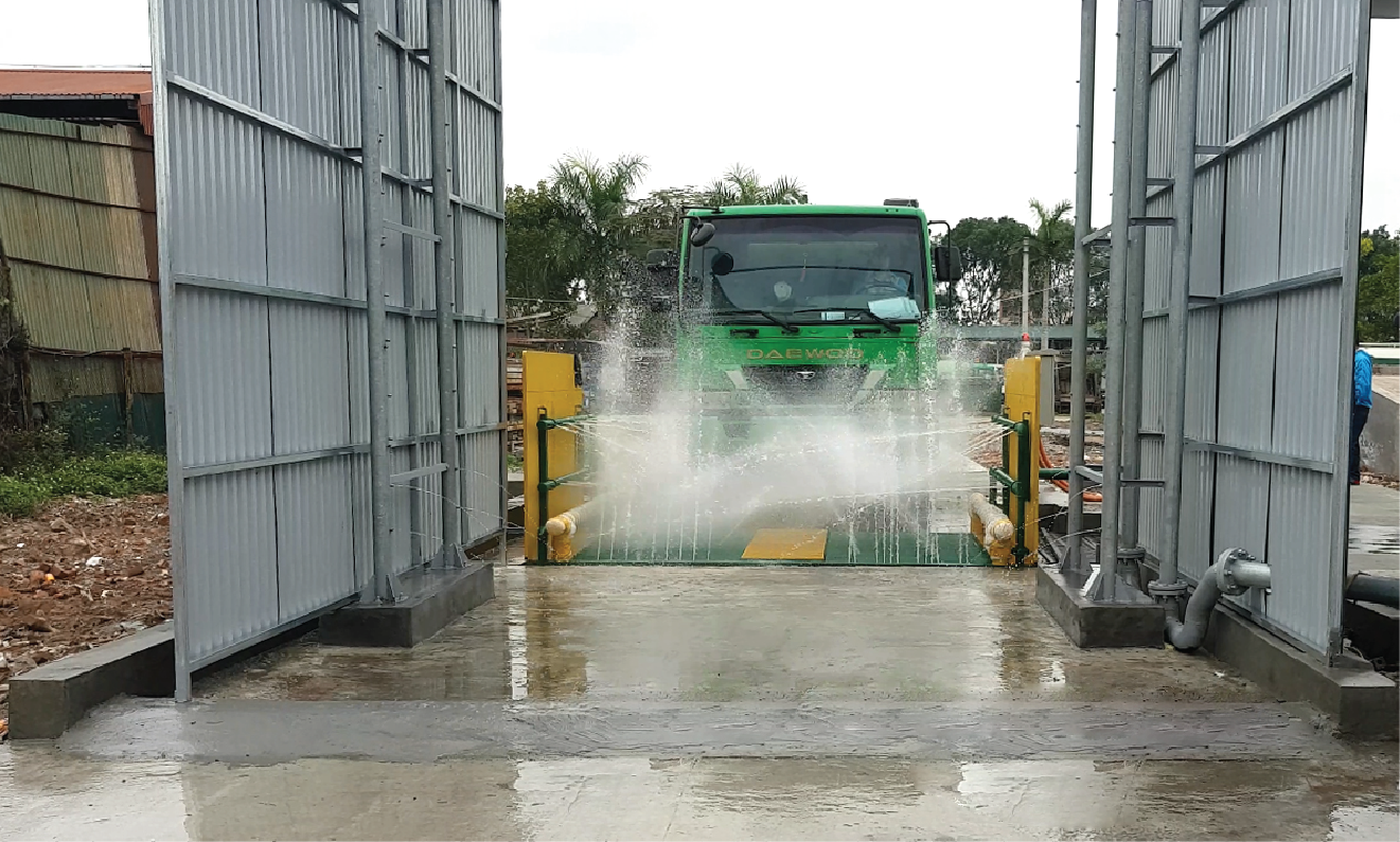 Automatic garbage truck washing system